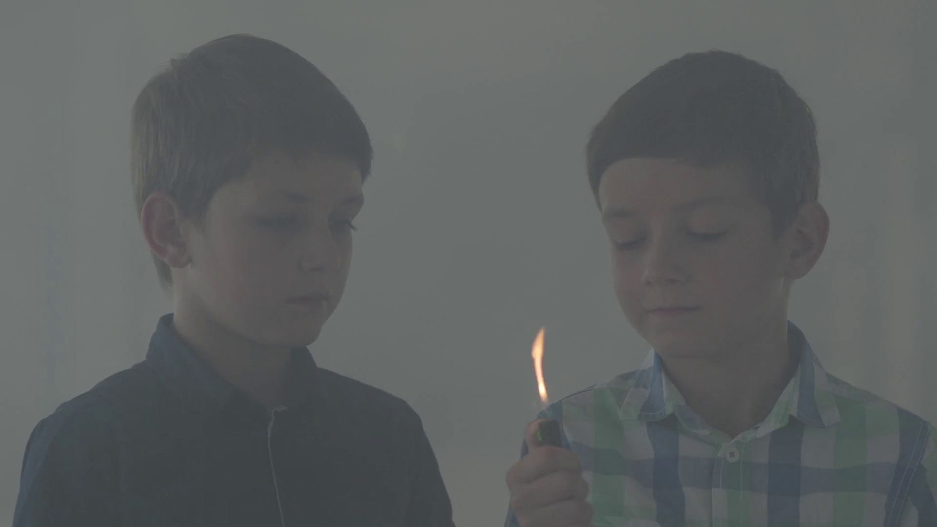 Siblings Having Fun With Lighter In Dimly Stock Footage SBV-336984962 ...