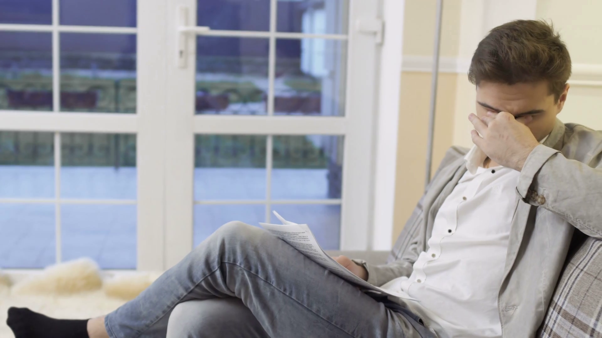 Fatigued Young Man Rests On Couch At Home Stock Footage SBV-321249546 ...