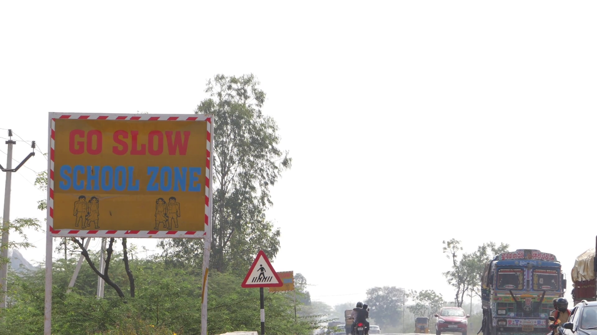 Video Clip Of Sign Board With Go Slow School Stock Footage SBV ...