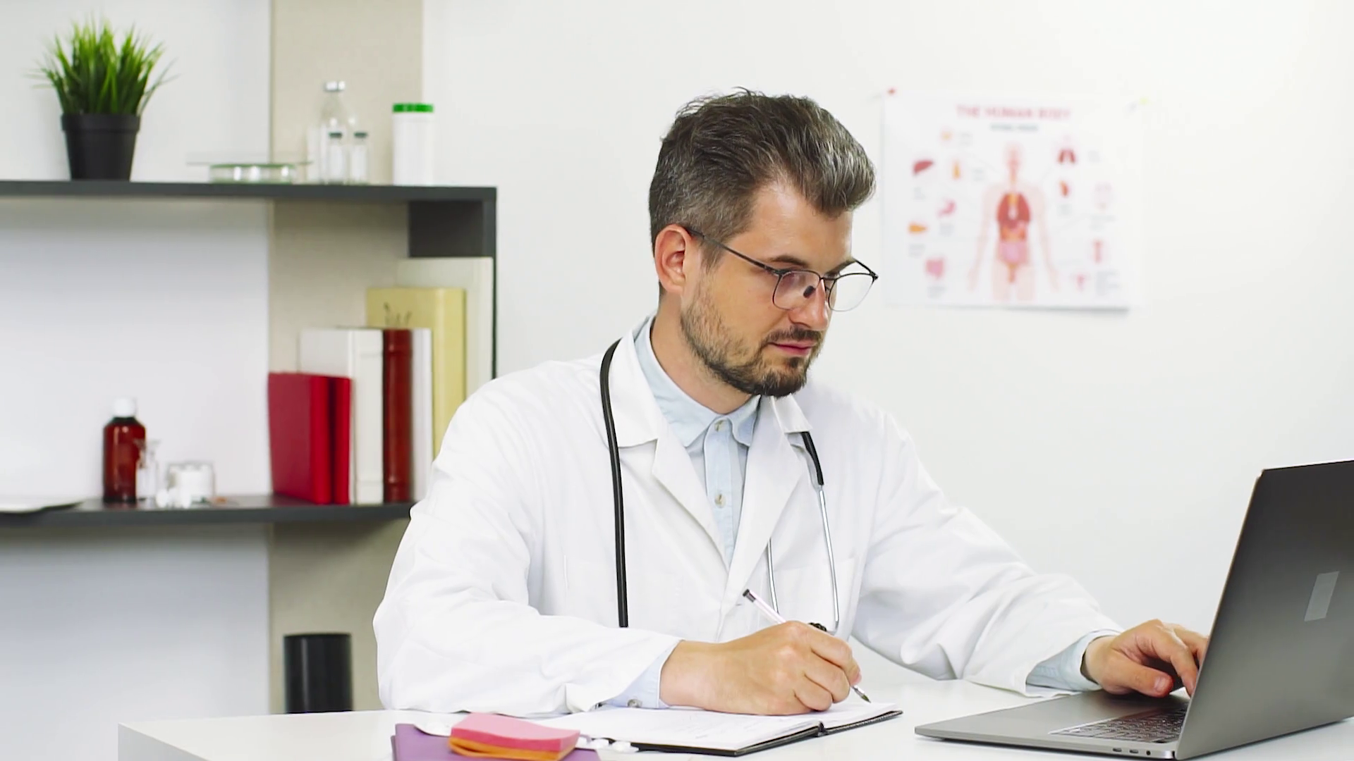 Modern Doctor Working With Medical Files Stock Footage SBV-338606895 ...