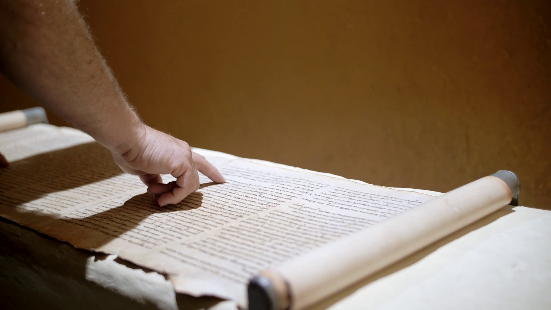 Man Reading Ancient Biblical Scroll In Stock Footage SBV-347748357 - Storyblocks