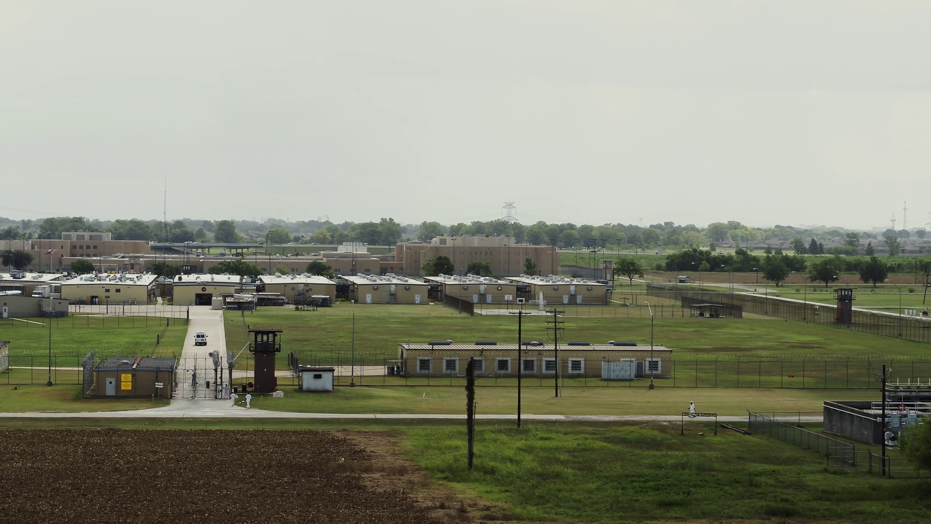 Aerial Prison Gate At Correctional Facility Stock Footage SBV-353380131 ...
