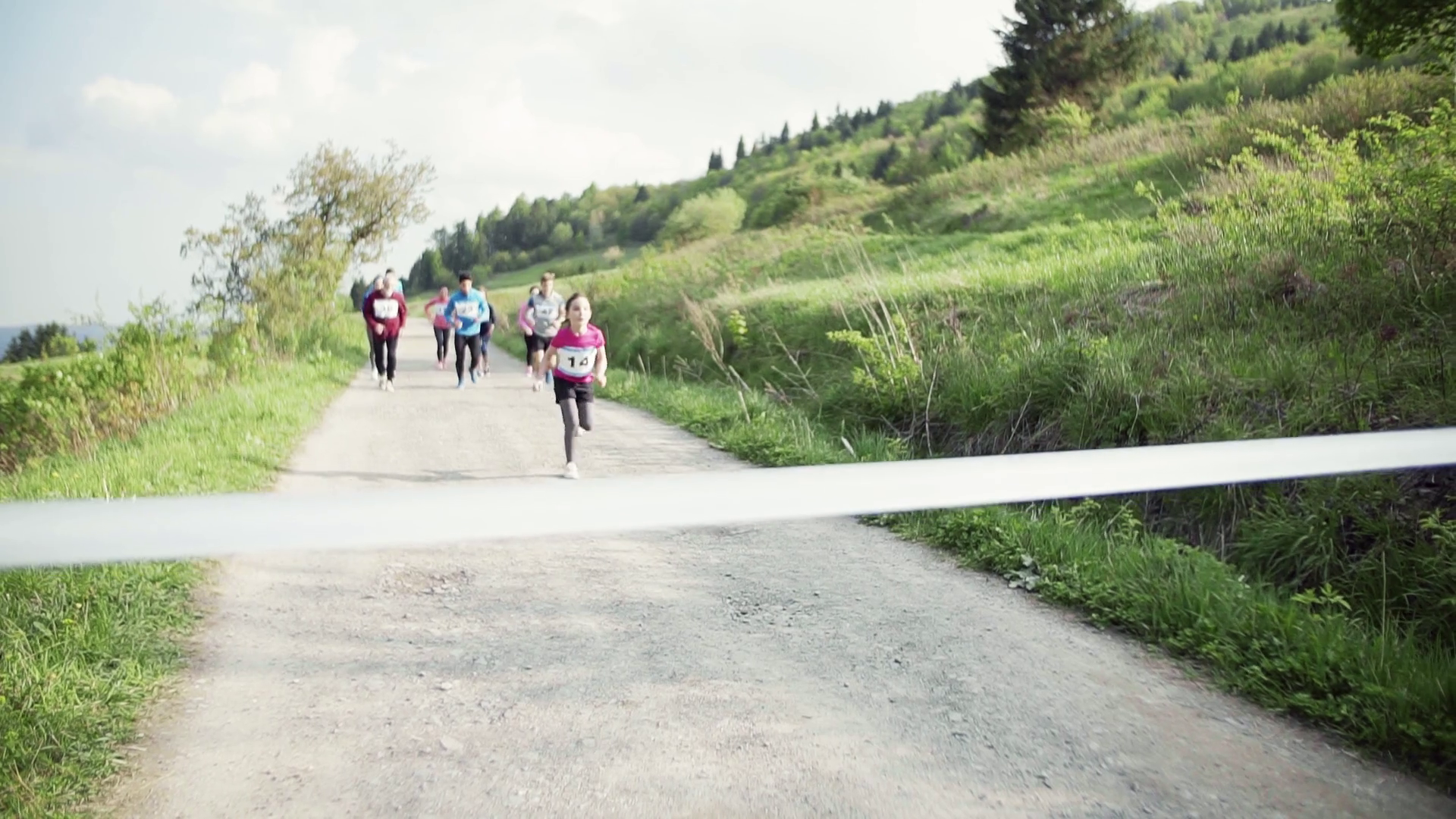 Young Runner Crossing Finish Line In Nature Stock Footage SBV-336300533 ...