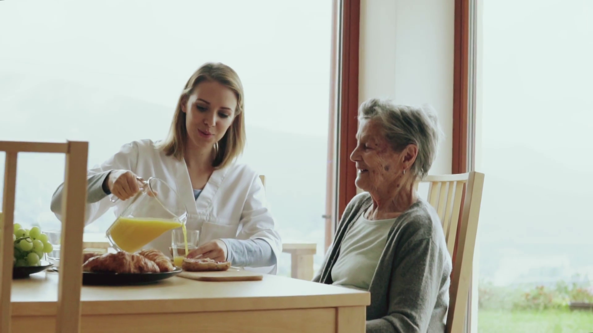 Health Visitor Senior Woman During Home Visit Stock Footage SBV ...