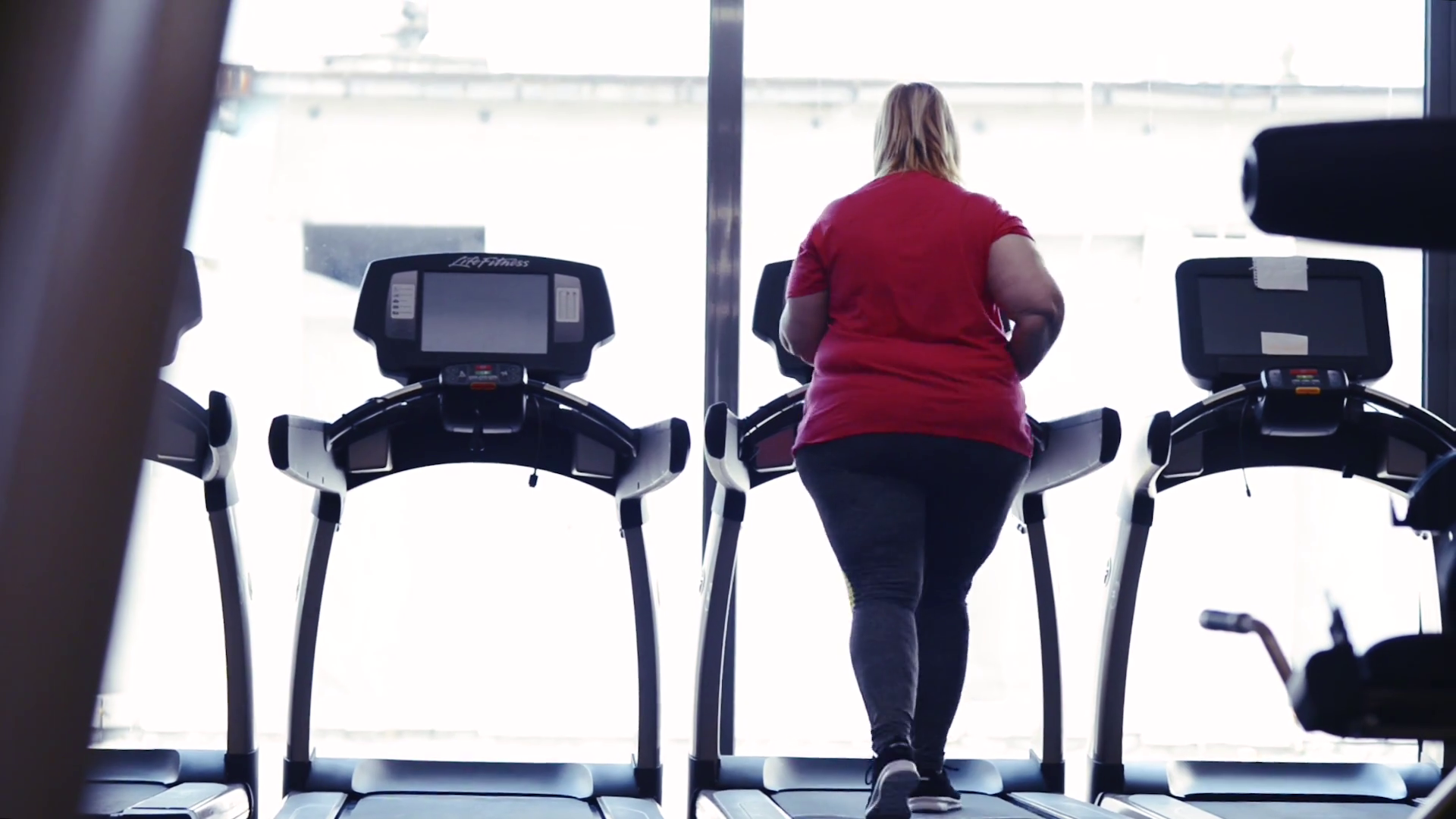 Overweight Woman Walking On Treadmill In Stock Footage SBV-315246811 ...