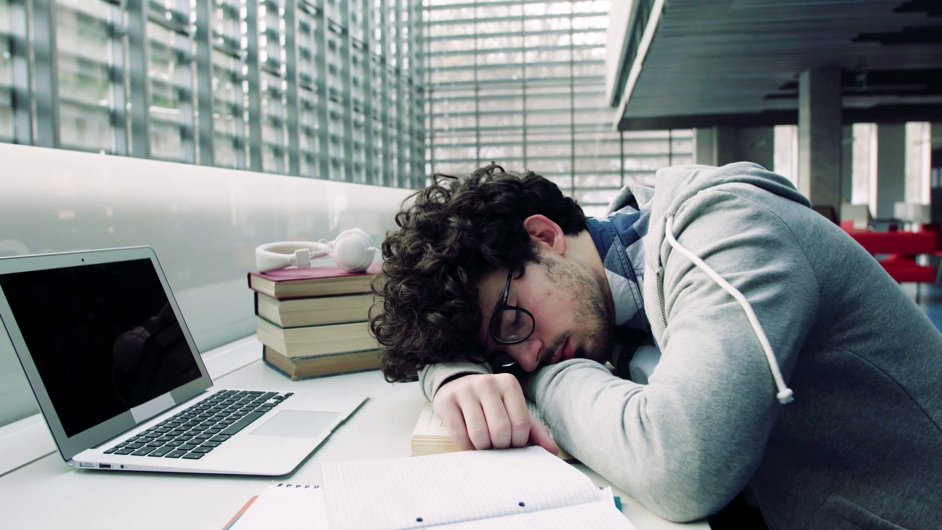 Students Studying In Library Resting At Desks Stock Footage SBV ...