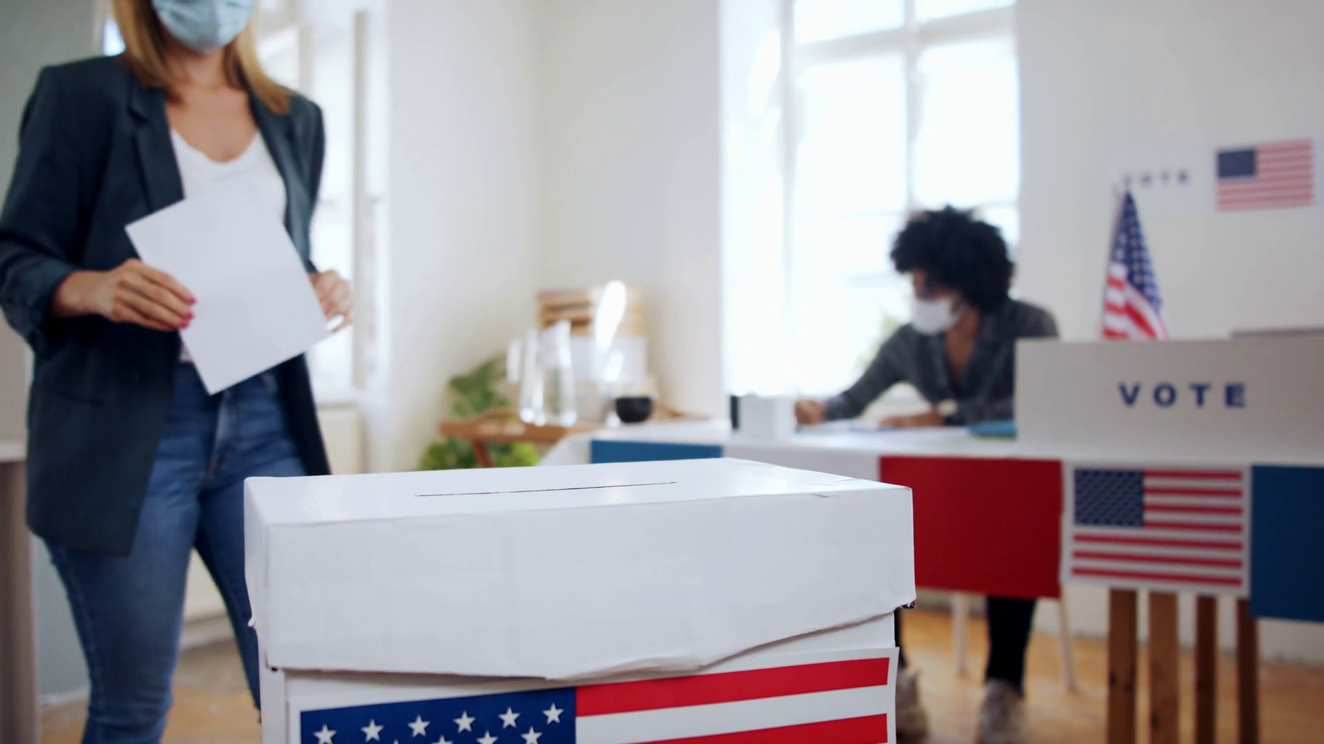 Young Woman Putting Vote In Ballot Box Usa Stock Footage SBV-338776469 ...
