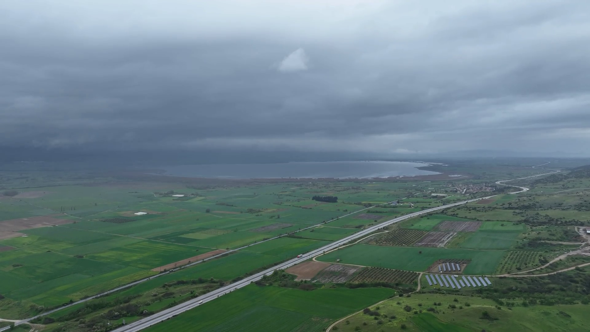 Wide Aerial Of Flat Farmland Stretching Stock Footage SBV-352422200 ...