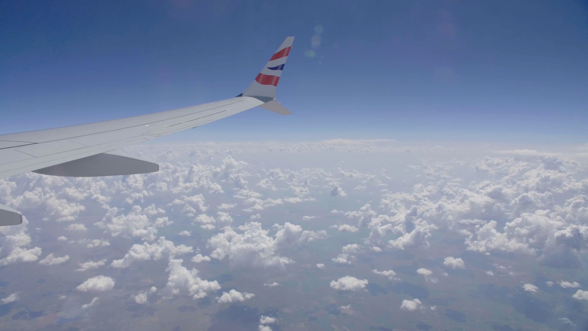 Plane Over Clouds Wing View From Window Stock Footage SBV-337340433 ...