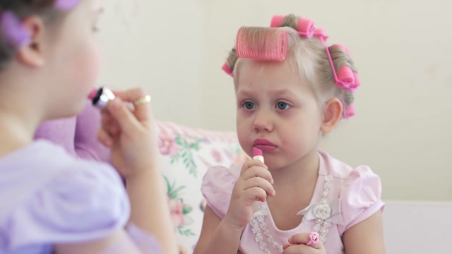 Little Girl Putting Lipstick Stock Footage: Royalty-Free Video Clips ...