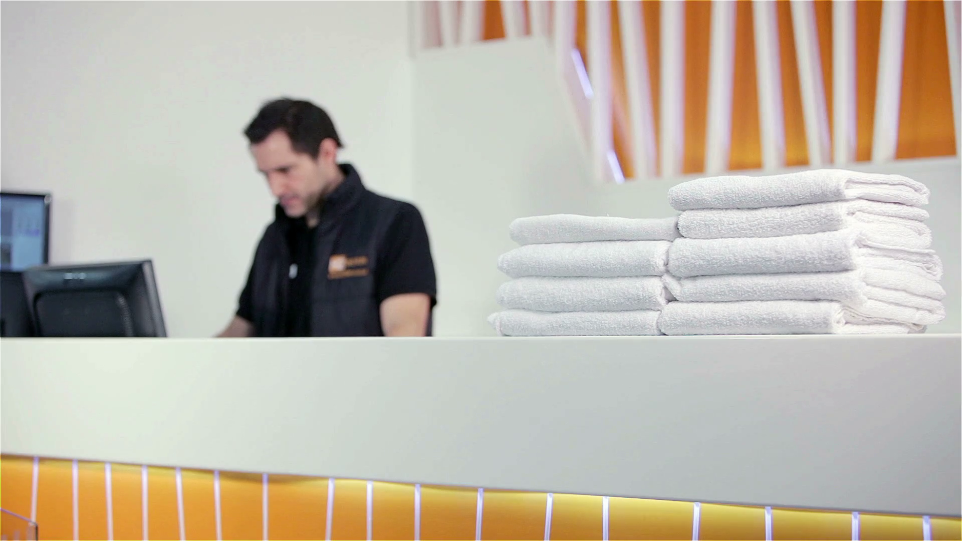 Gym Receptionist At Front Desk With Towels Stock Footage SBV-301234649 ...