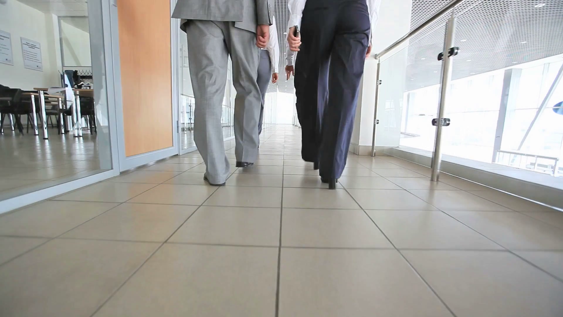 Business Team Marching Along Corridors Of Stock Footage SBV-300857550 ...