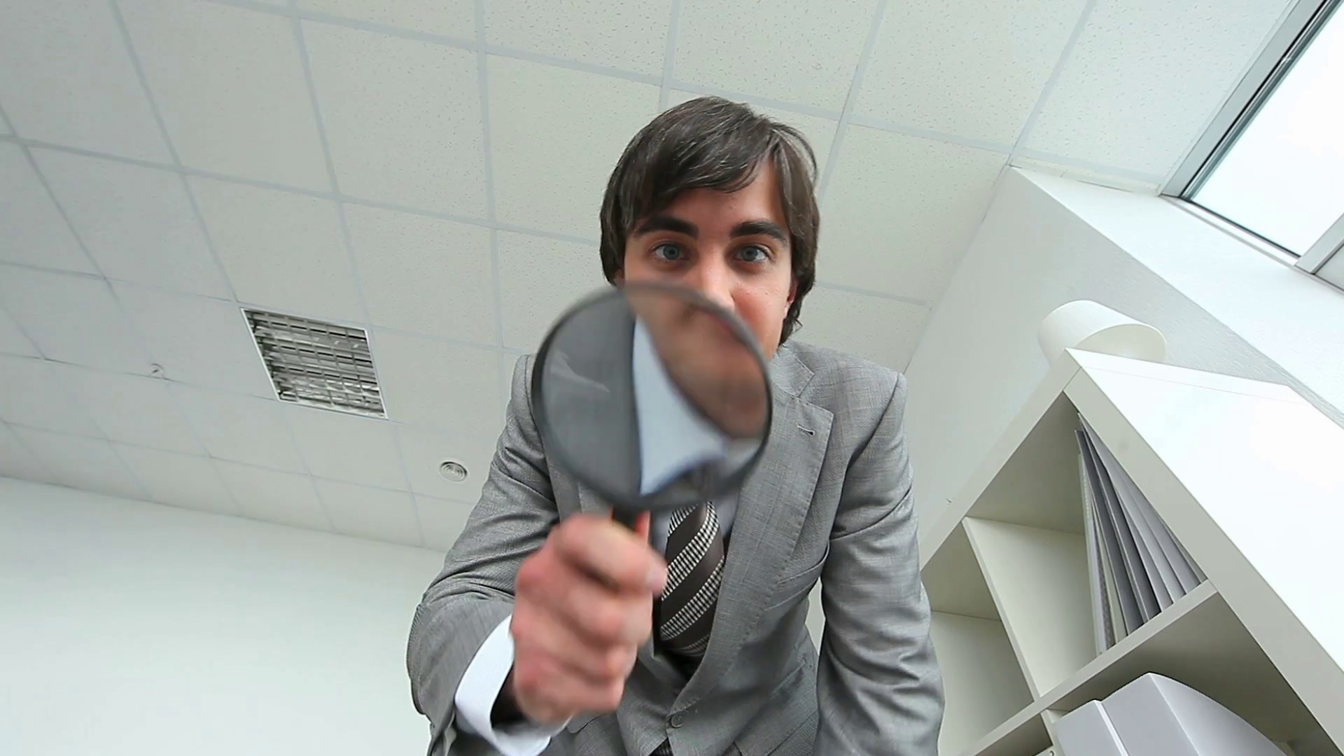 Curious Man Looking At Through Magnifying Stock Footage SBV-300856939 ...