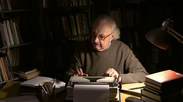 Old Man Writing A Book Stock Footage: Royalty-Free Video Clips ...