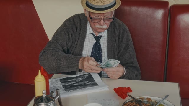 Old Man Counting Money Stock Footage: Royalty-Free Video Clips ...