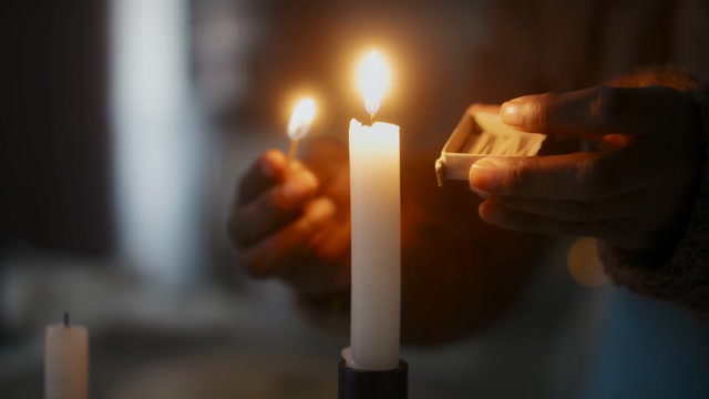 Person Lighting A Candle Stock Footage: Royalty-Free Video Clips ...