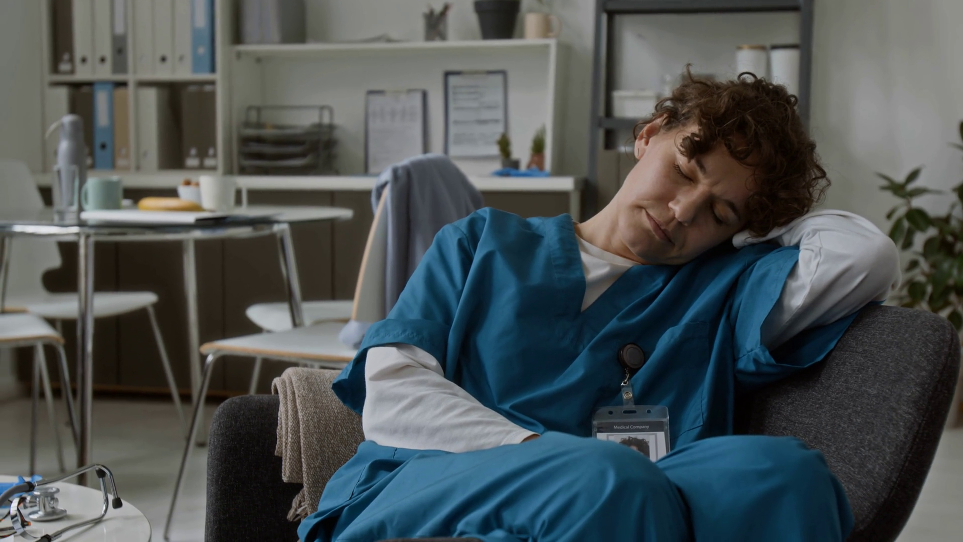 Young Tired Female Medical Assistant In Blue Stock Footage SBV ...