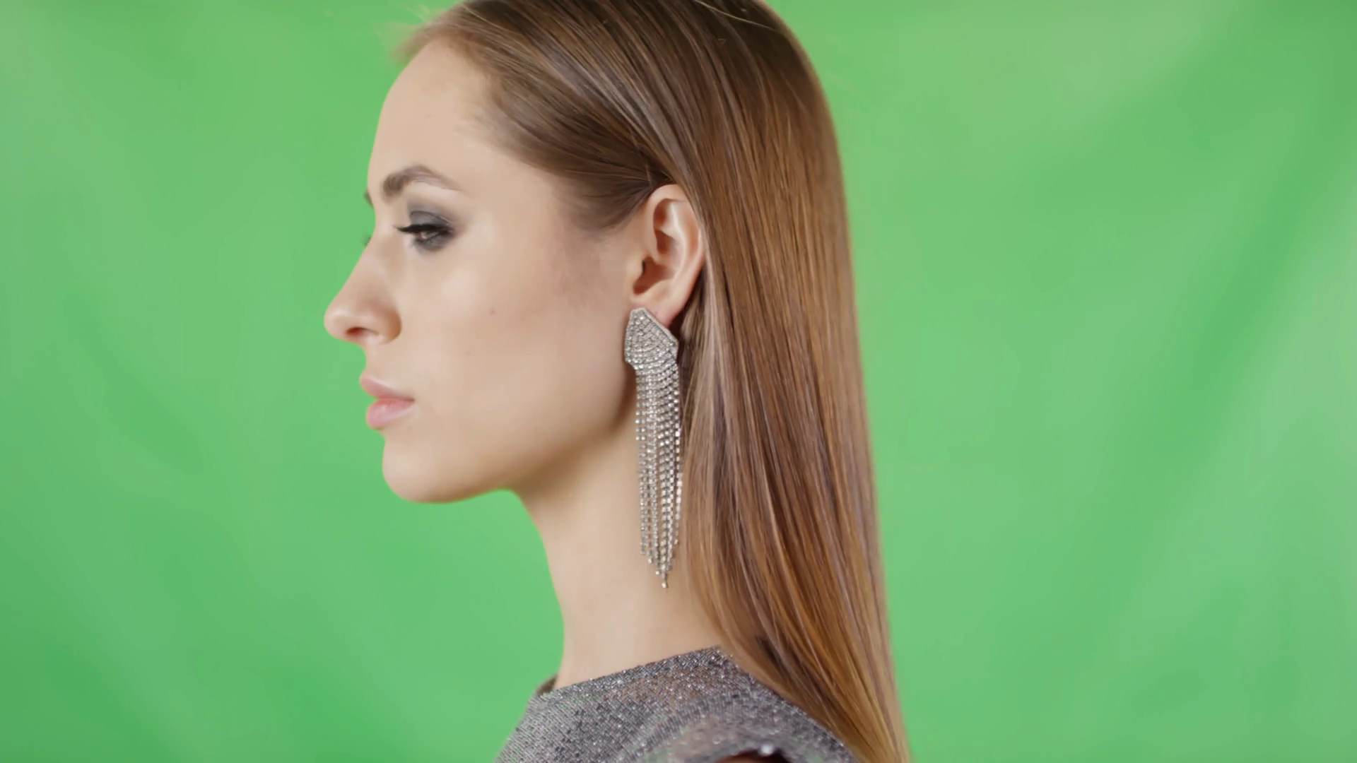Fashion Model Showcasing Elegant Earrings On Stock Footage SBV ...