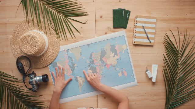 Woman Looking World Map Stock Footage: Royalty-Free Video Clips ...