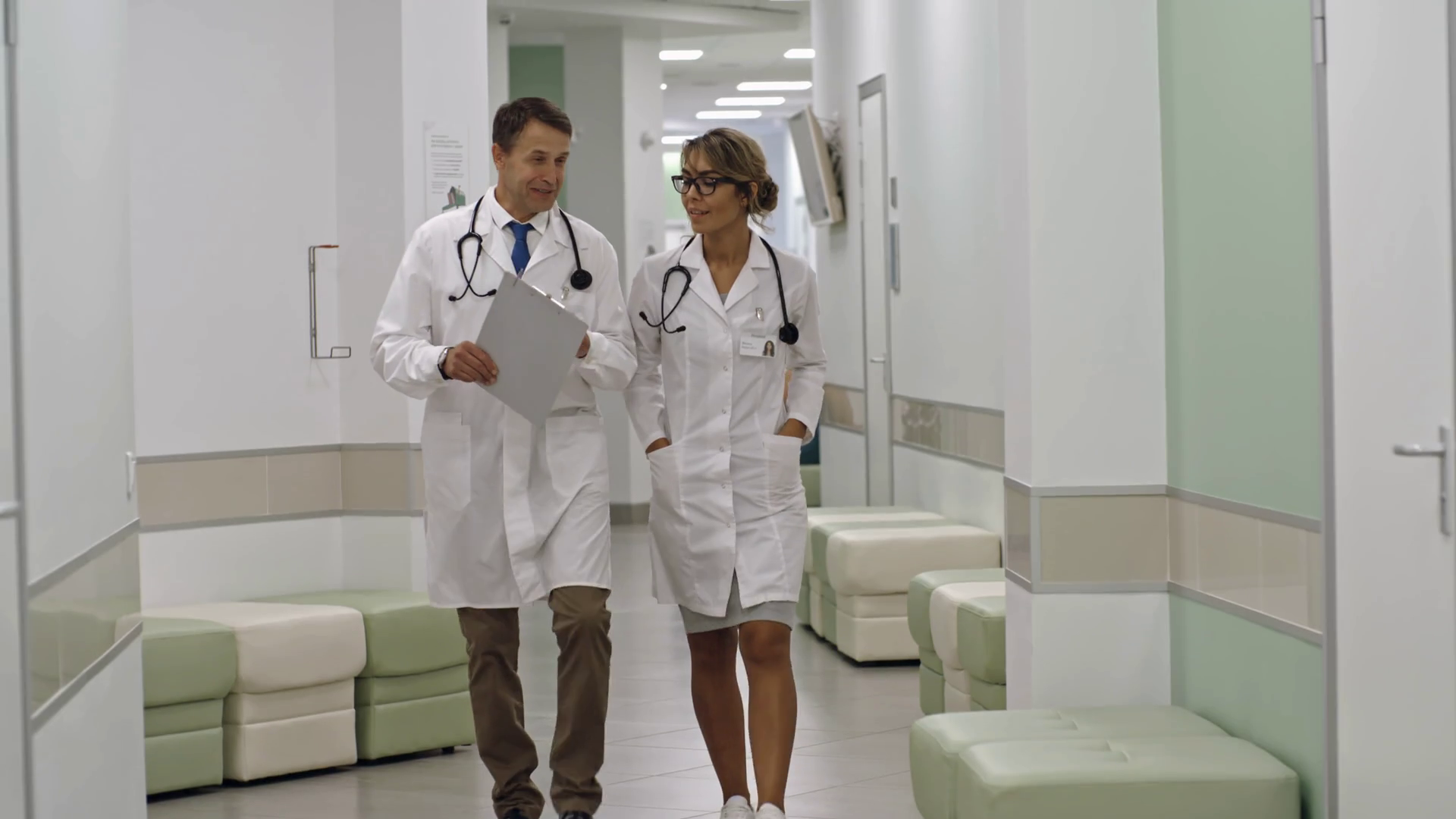 Medical Doctor Walking Through Hospital Stock Footage SBV-318978345 ...