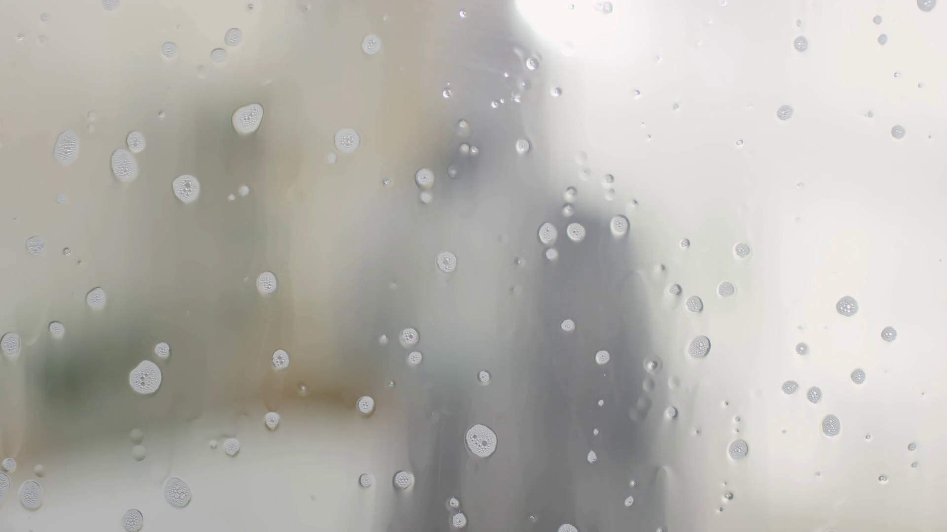 Medium shot of unrecognizable person spraying sanitizing liquid on ...