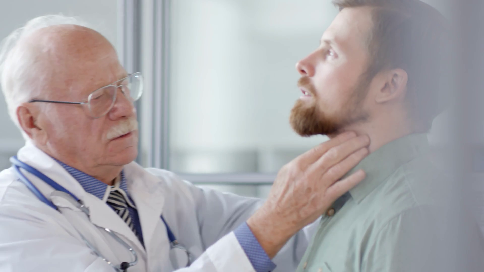 Experienced Doctor Examining Neck Checking Stock Footage SBV-335005930 ...