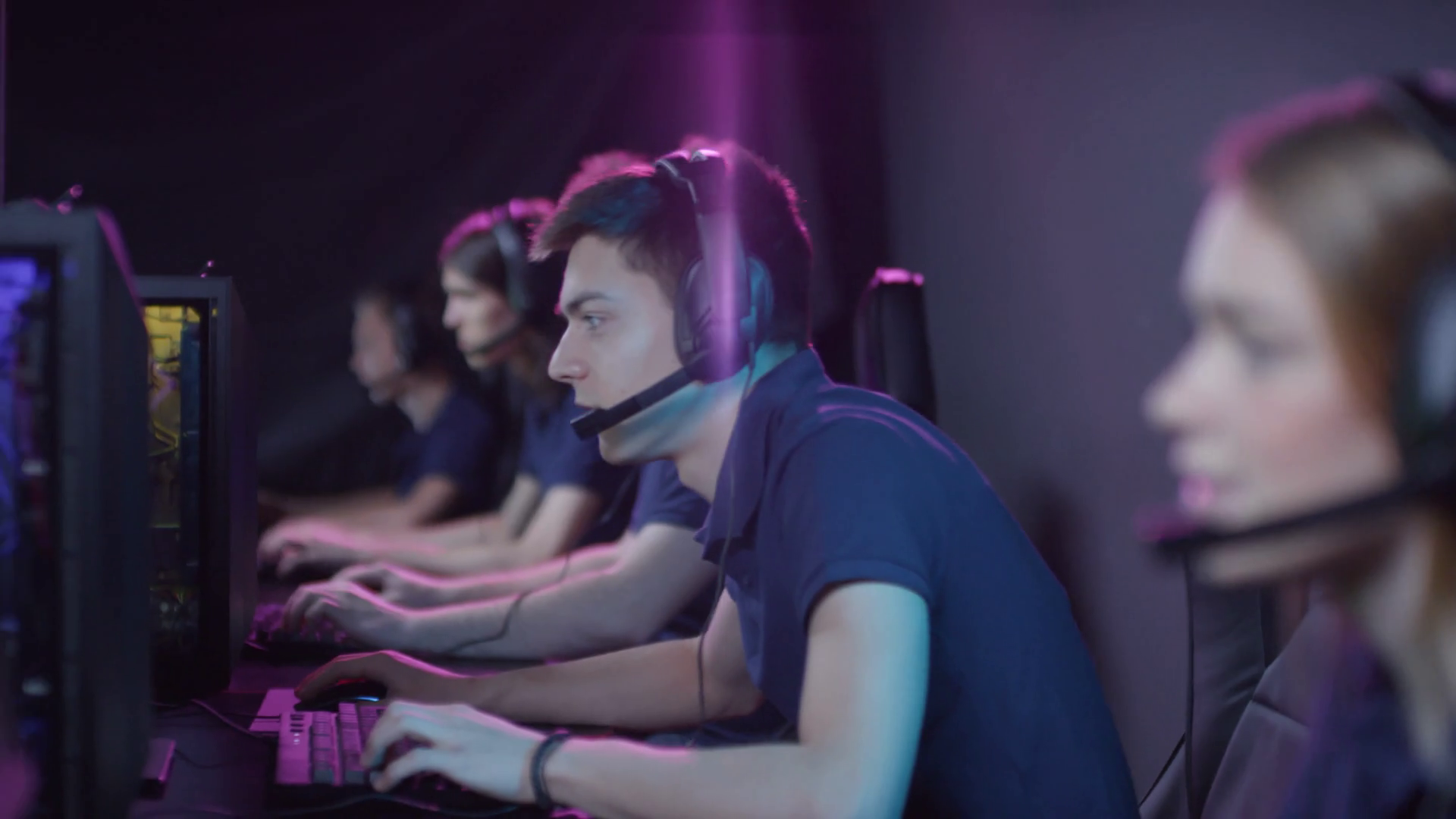 Sequence of shots footage of modern shooter gamer team taking part in ...