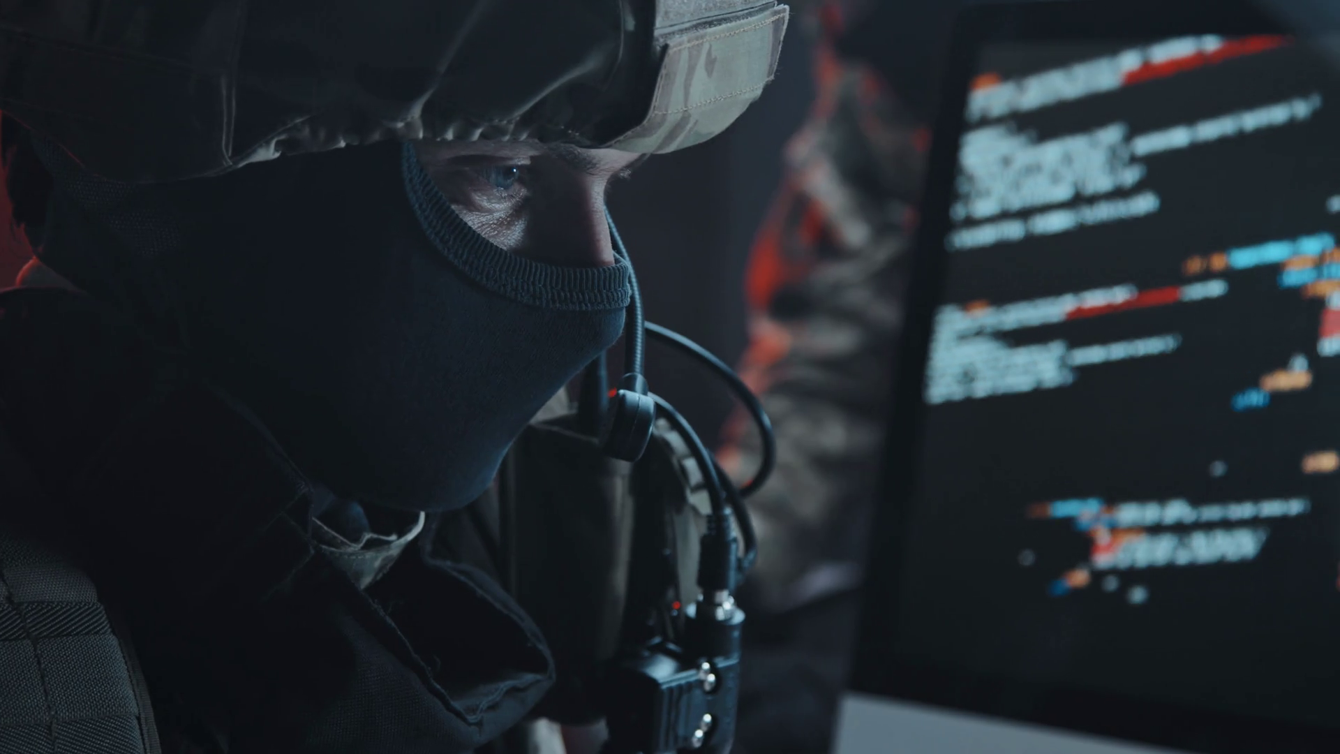 Slowmo close up tilt down shot of SWAT officer in uniform sitting at ...