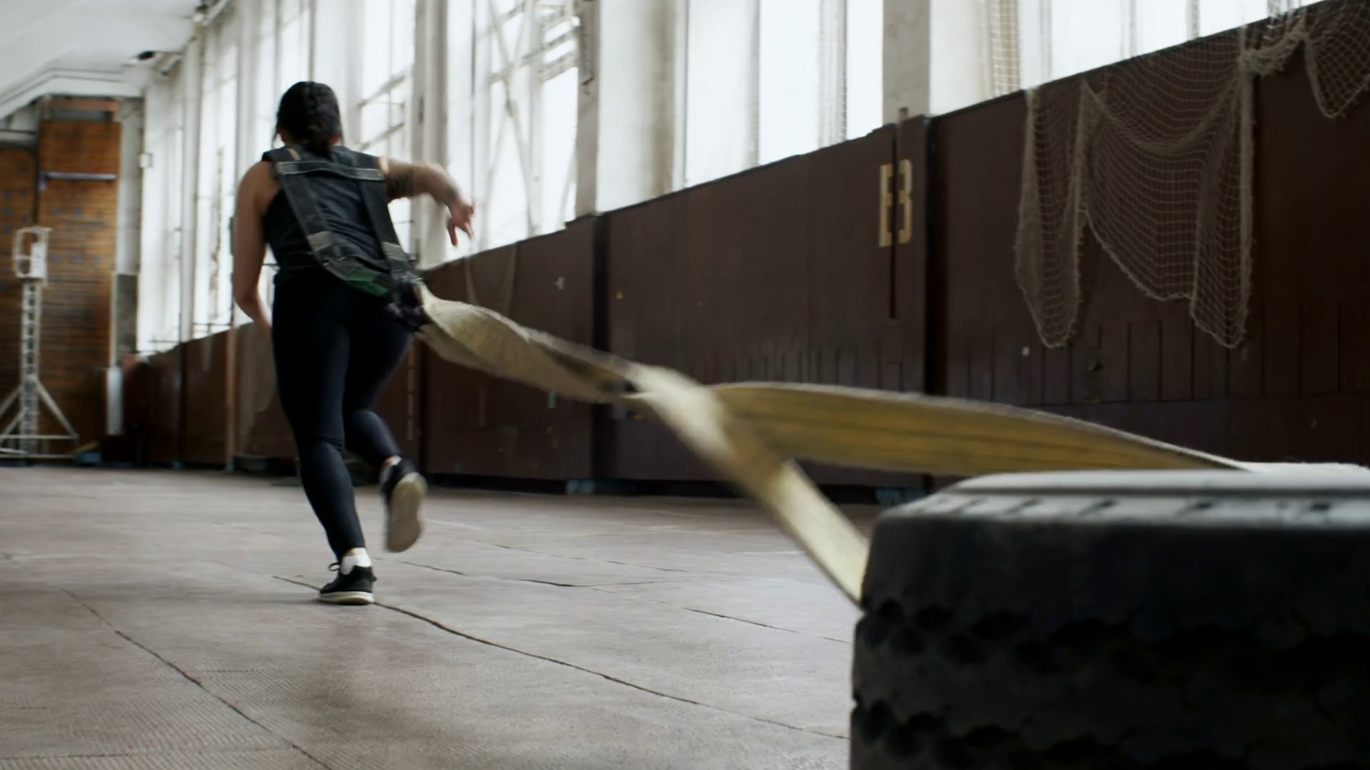 Tracking Of Strong Woman Running Pulling Stock Footage SBV-323702308 ...
