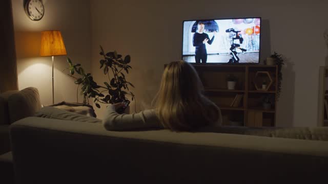 Two Girls Watching Television Stock Footage: Royalty-Free Video Clips ...