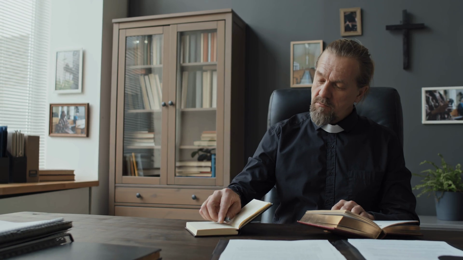 Medium Portrait Of Catholic Priest Sitting Stock Footage SBV-347771719 ...
