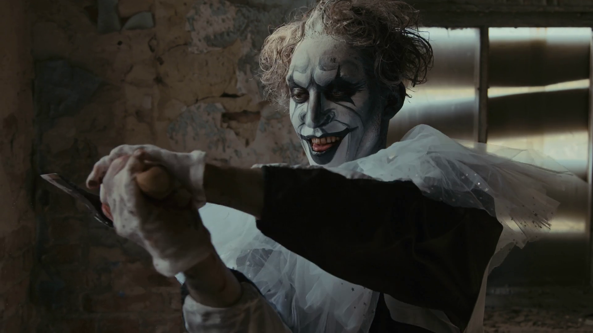 Medium Shot Of Crazy Clown With Axe Dancing Stock Footage SBV-348505767 ...