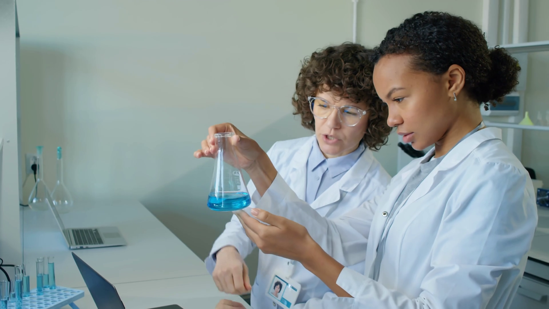 Closeup Of Two Diverse Lab Scientists Stock Footage SBV-347708169 ...