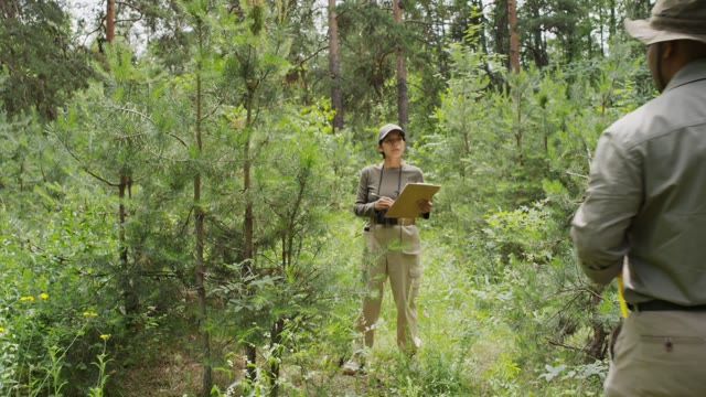 Naturalists And Botanists In The Field Stock Footage: Royalty-Free ...