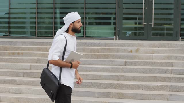 Muslim Man Walking Stock Footage: Royalty-Free Video Clips - Storyblocks
