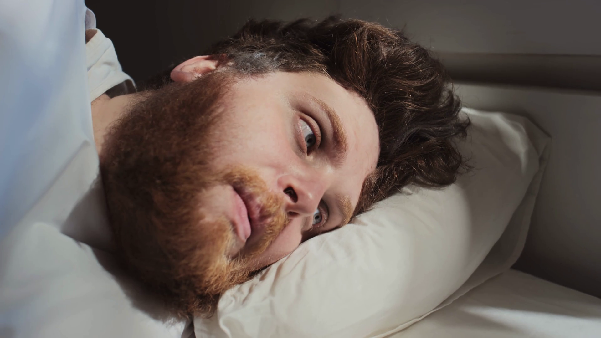 Portrait Of Young Caucasian Man Waking Up In Stock Footage SBV ...