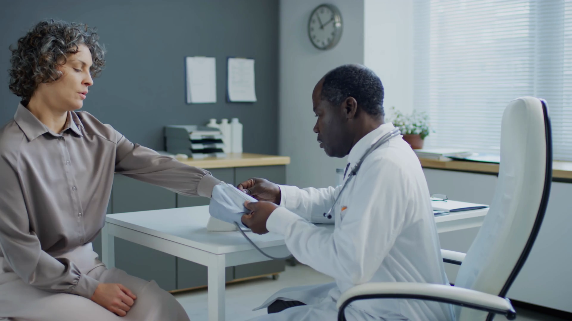 Medium Side Shot Of Black Male Doctor Using Stock Footage SBV-348621487 ...