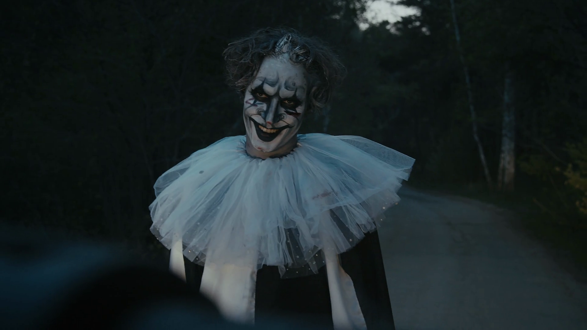 Medium Shot Of Creepy Clown Running Car On Stock Footage SBV-348507252 ...