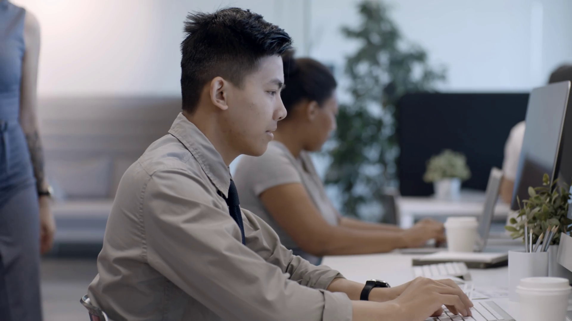 Young Asian Male Office Worker Sitting At Stock Footage SBV-320664079 ...