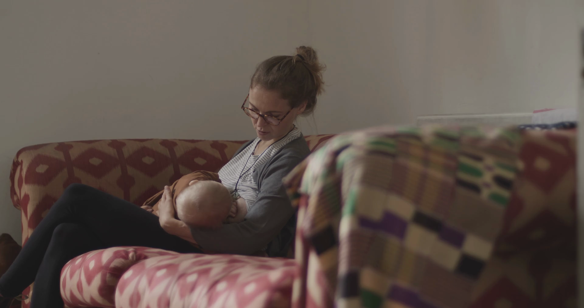 Single Mother Breastfeeding Baby On Sofa Stock Footage SBV-351915435 ...