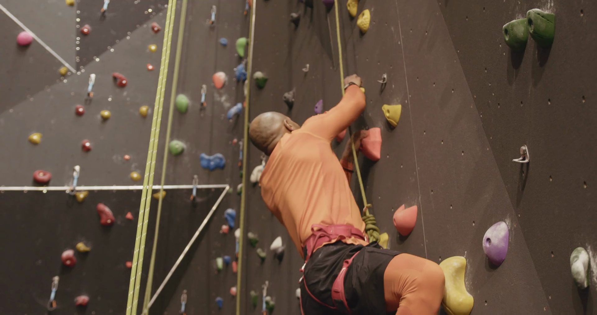 Male Athlete Exercise Rock Climbing At Roped Stock Footage SBV ...