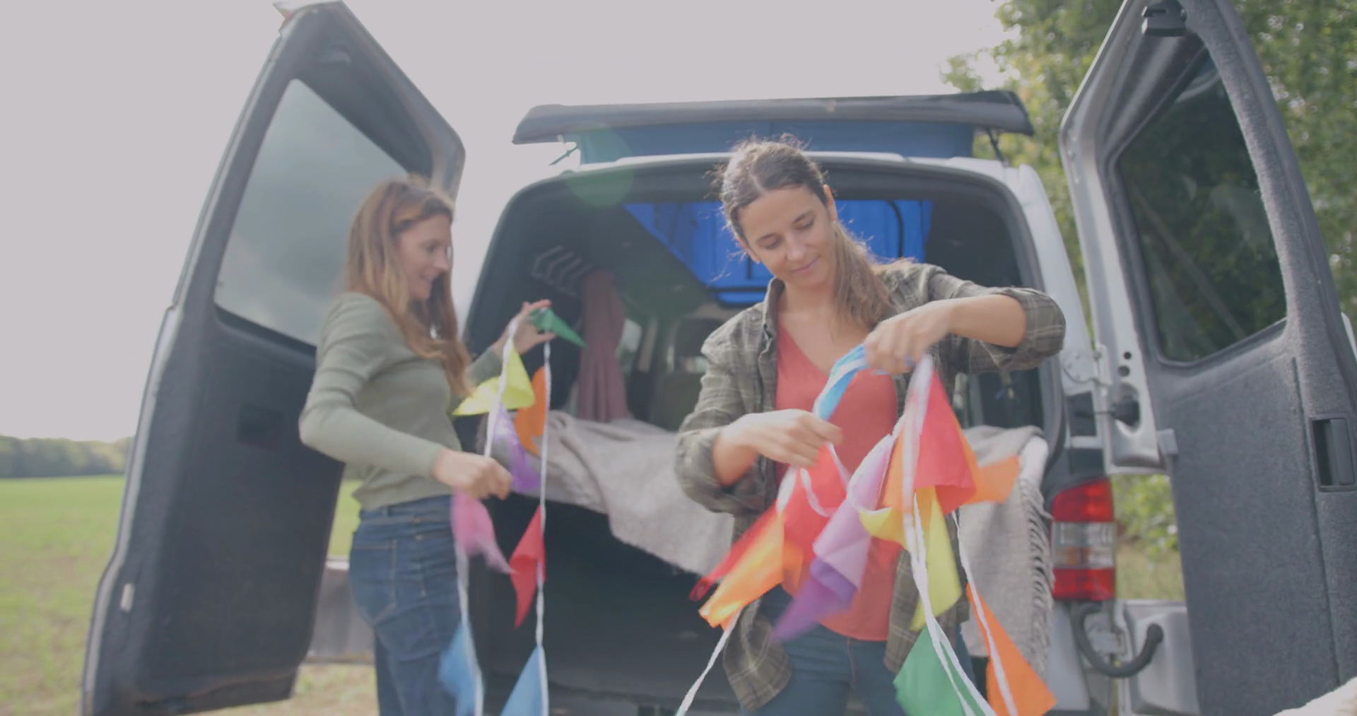 Female Friends Hanging Up Bunting Party Stock Footage SBV-351784398 ...