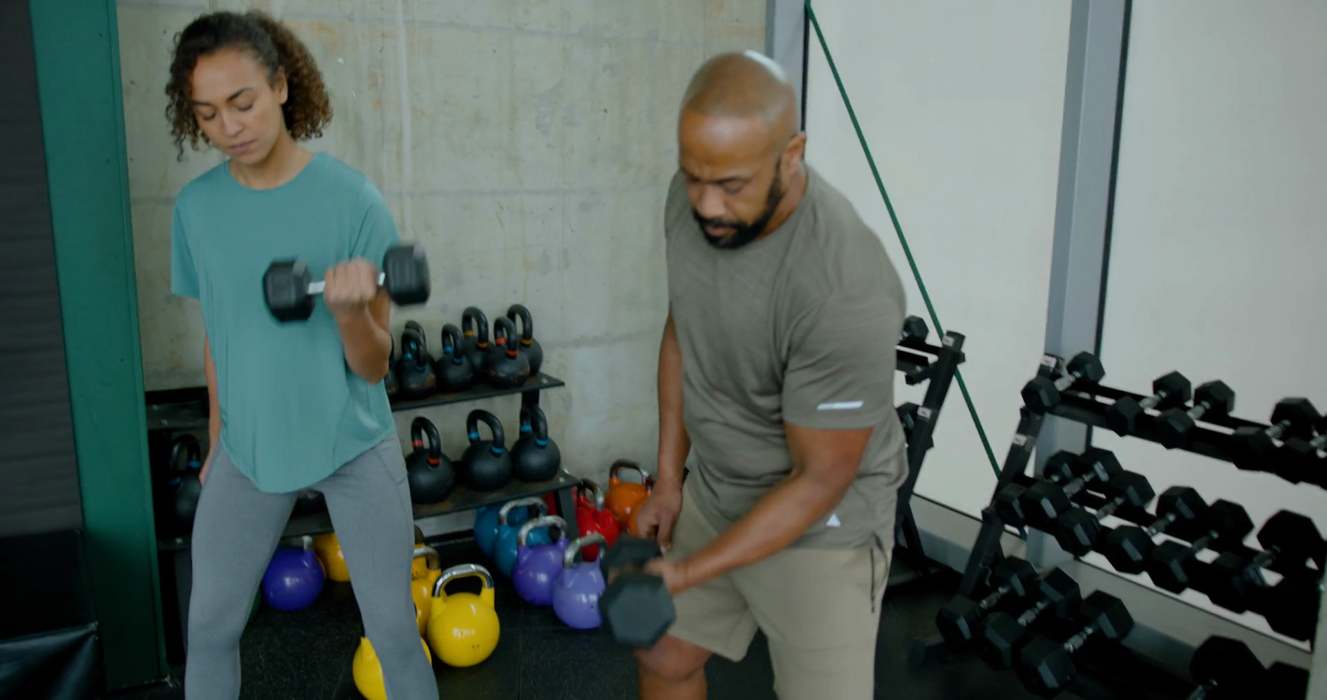 Two People Lifting Dumbbell Weights Stock Footage SBV-351779668 ...