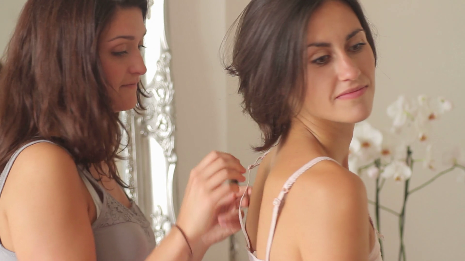 Female Friend Helping Adjusting Bra Straps Stock Footage SBV-338839867 ...