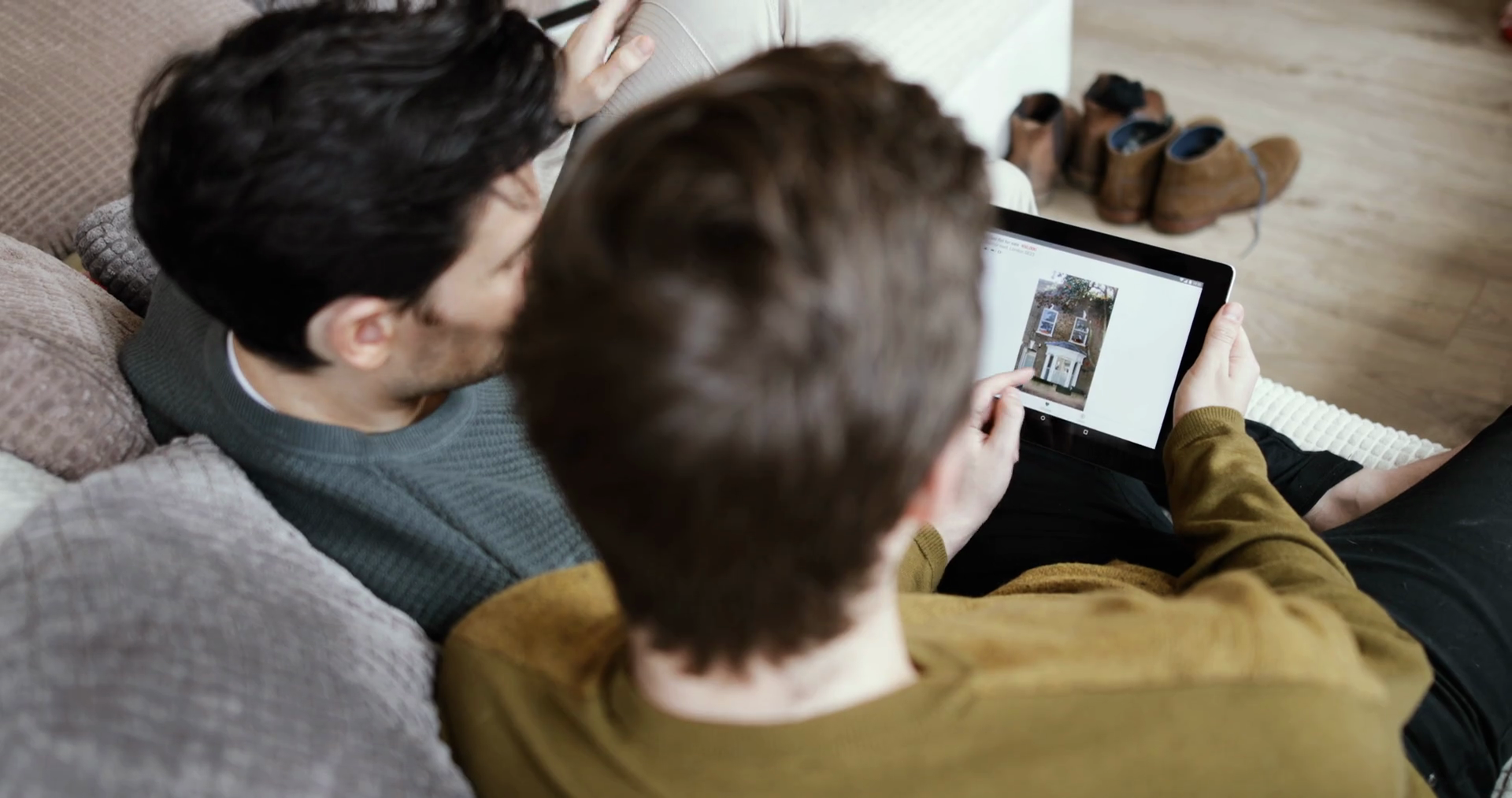 Young Couple Searching Home On Digital Tablet Stock Footage SBV ...