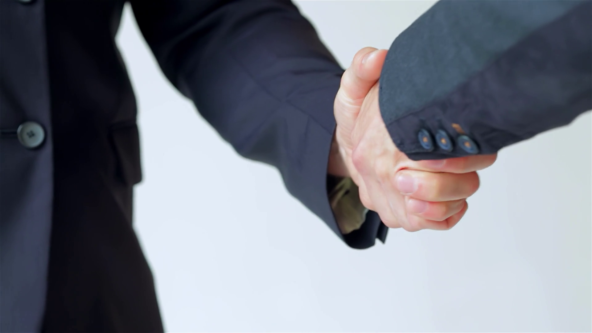 Dynamic Handshake Between Business Partners Stock Footage SBV-352144121 ...