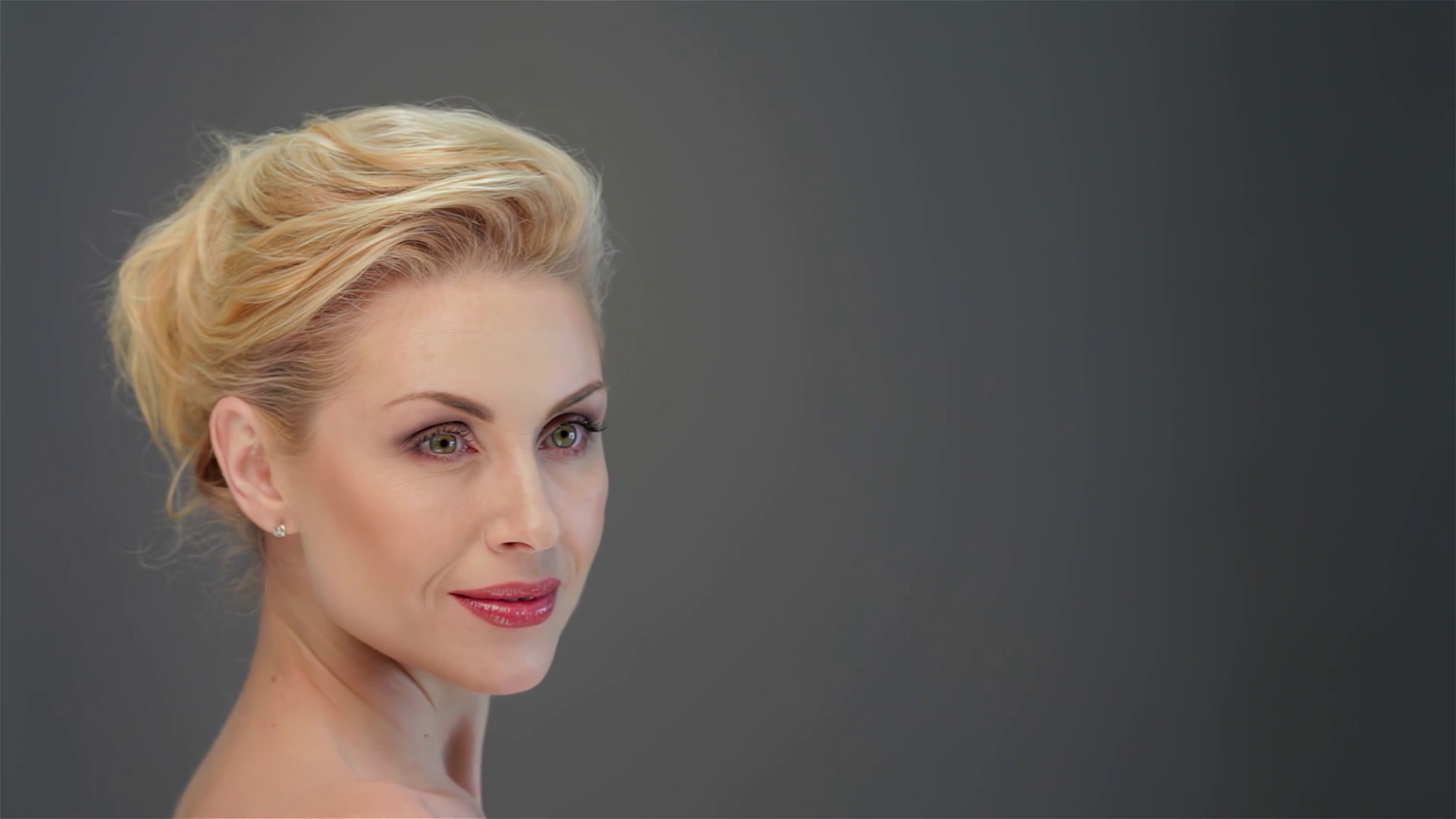 Elegant Blonde Woman Glances Over Shoulder Stock Footage SBV-352175780 ...