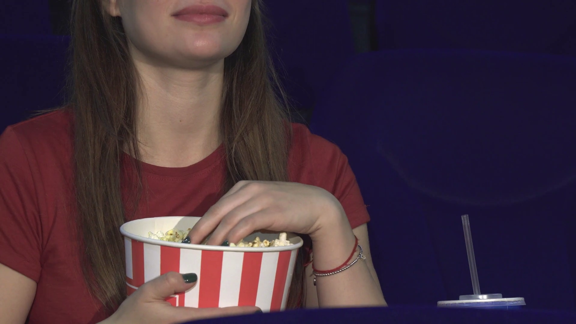 The Young Lady Is Eating Popcorn During Stock Footage SBV-346740485 ...
