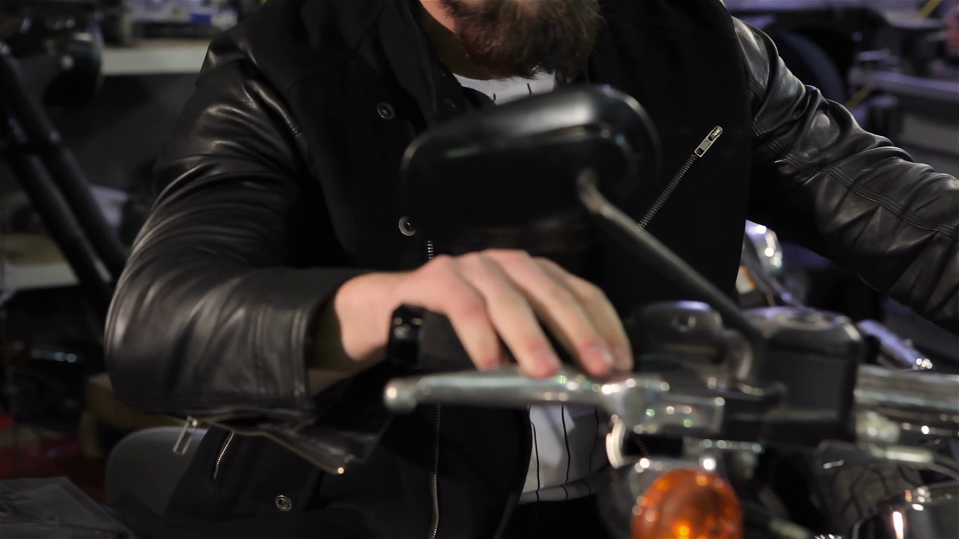 Male Biker Crosses Arms On Chest Sitting On Stock Footage SBV-348397573 ...