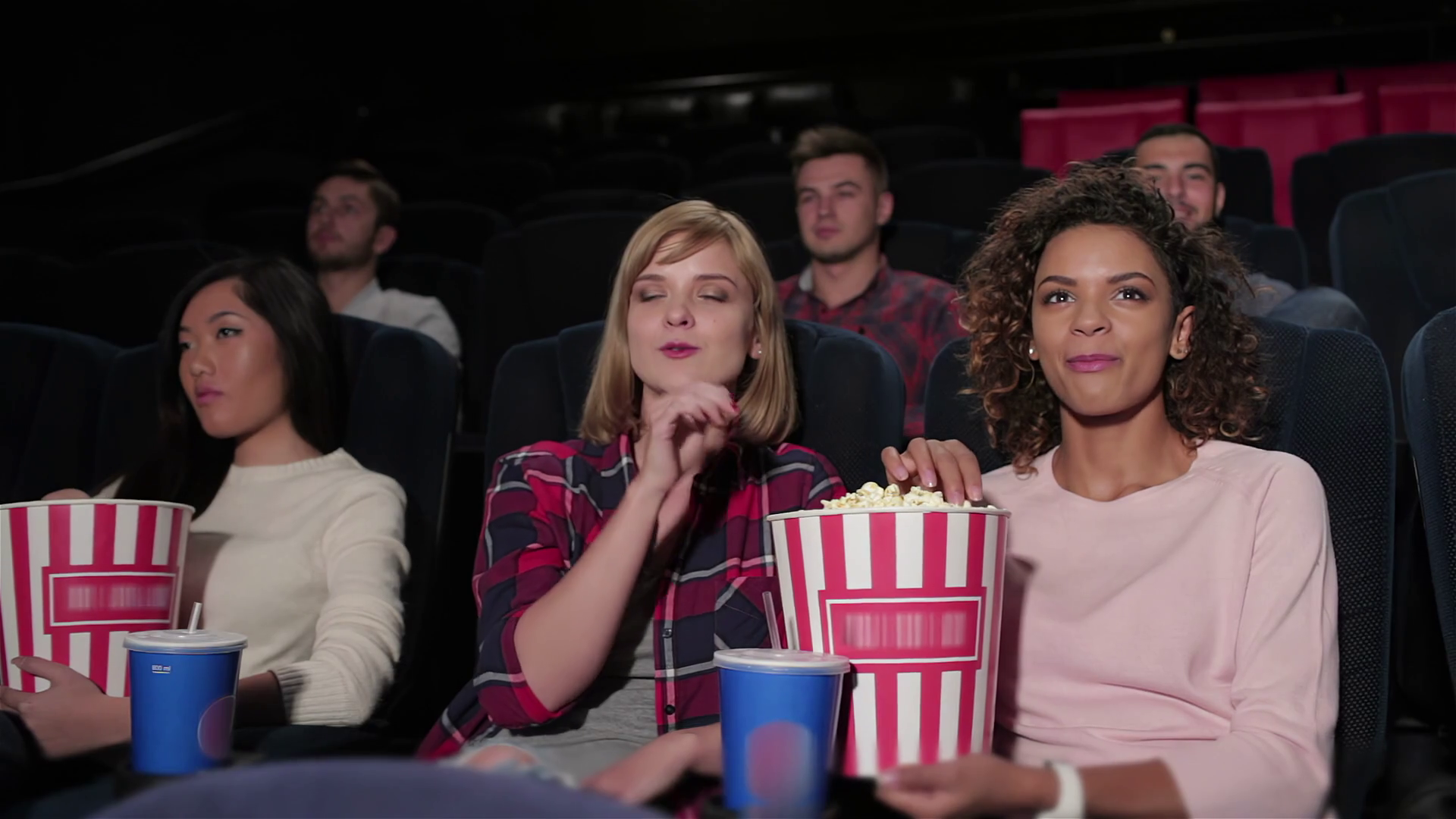 Young People Are Closely Watching Movie Stock Footage SBV-348515088 - Storyblocks